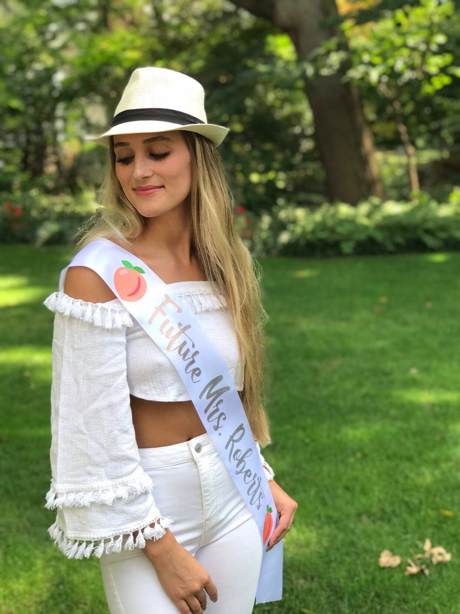 Peach satin sash store
